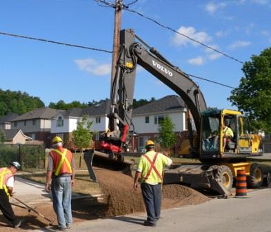 Road construction - Rototilt excavator attachment
